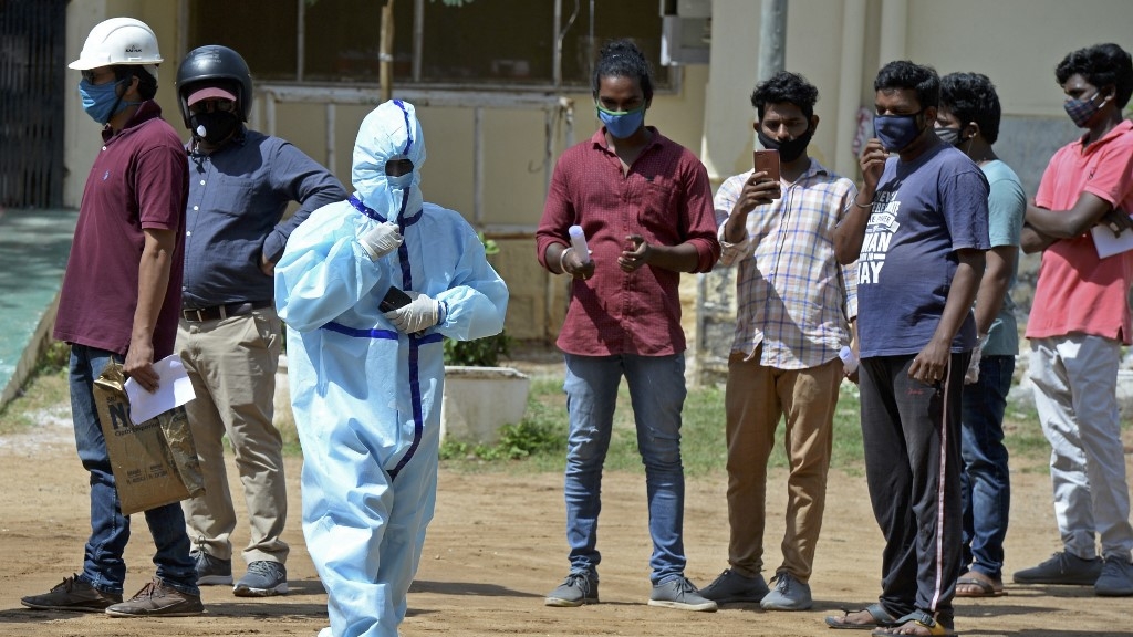 Indian women on pandemic front line strike for pay and protection