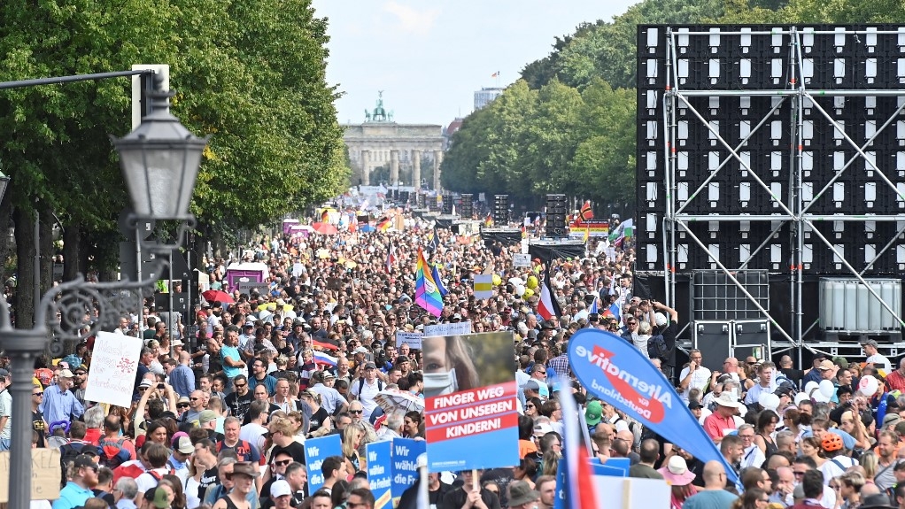 Berlin halts 'anti-corona' rally as European cities protest masks