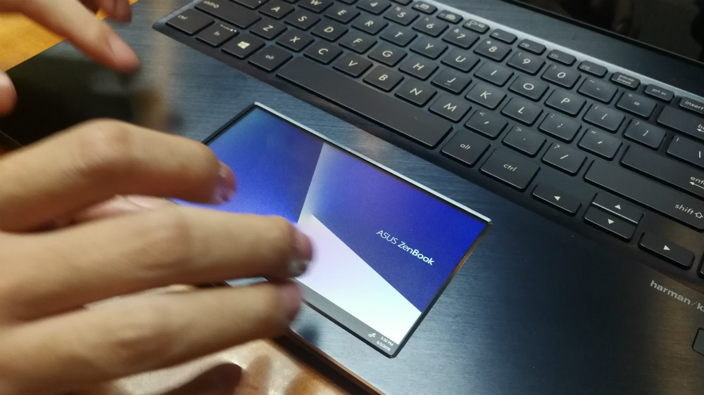 New ASUS laptop's touchpad doubles as full HD touchscreen New ASUS laptop's touchpad doubles as full HD touchscreen
